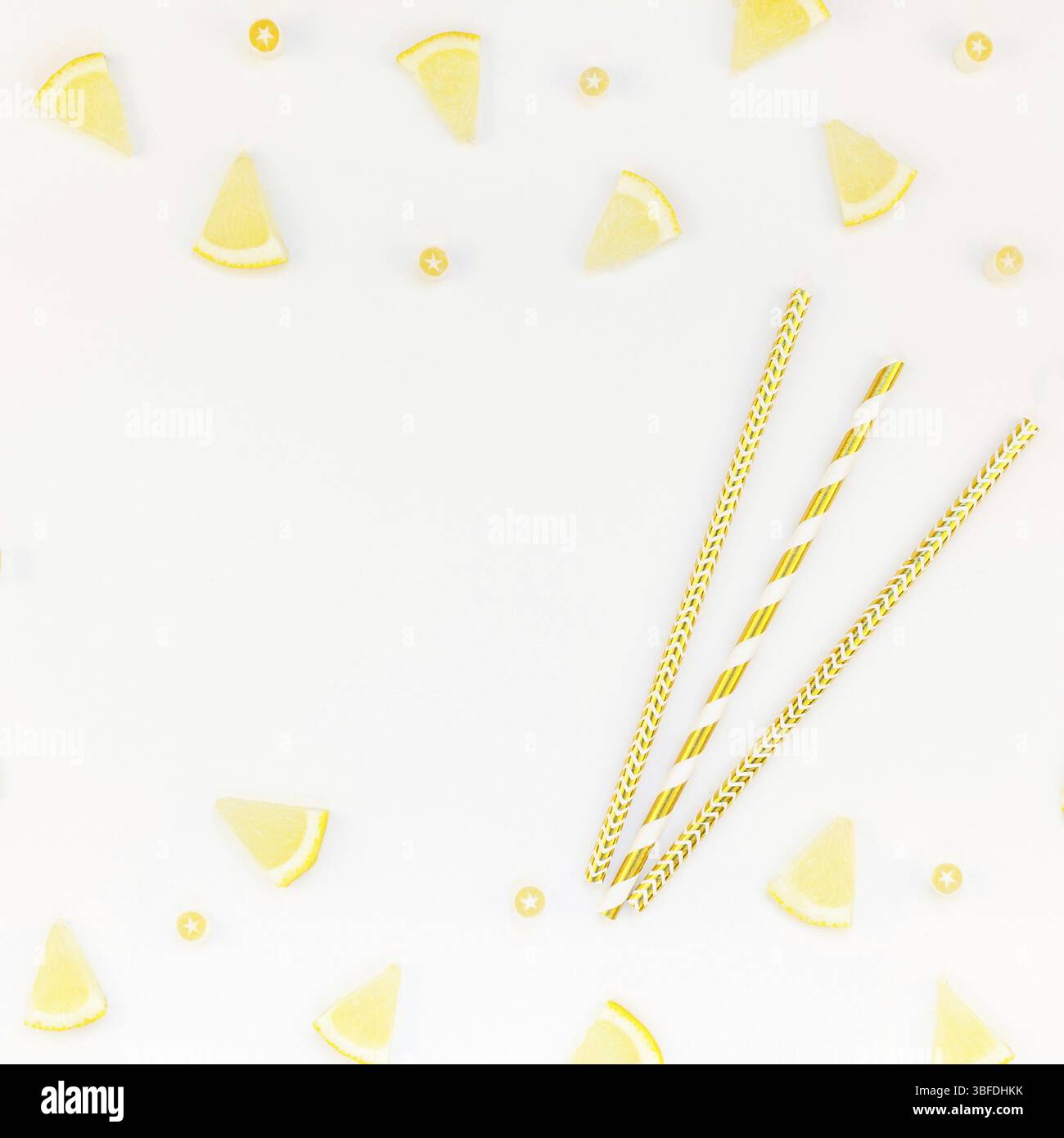 Square flatlay overhead top view citrus lemon slices pattern frame white table background with ...