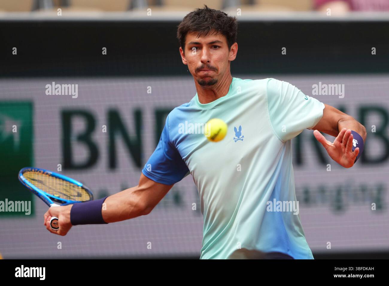 Australia's Alexei Popyrin returns the ball to Tommy Paul of the U.S ...