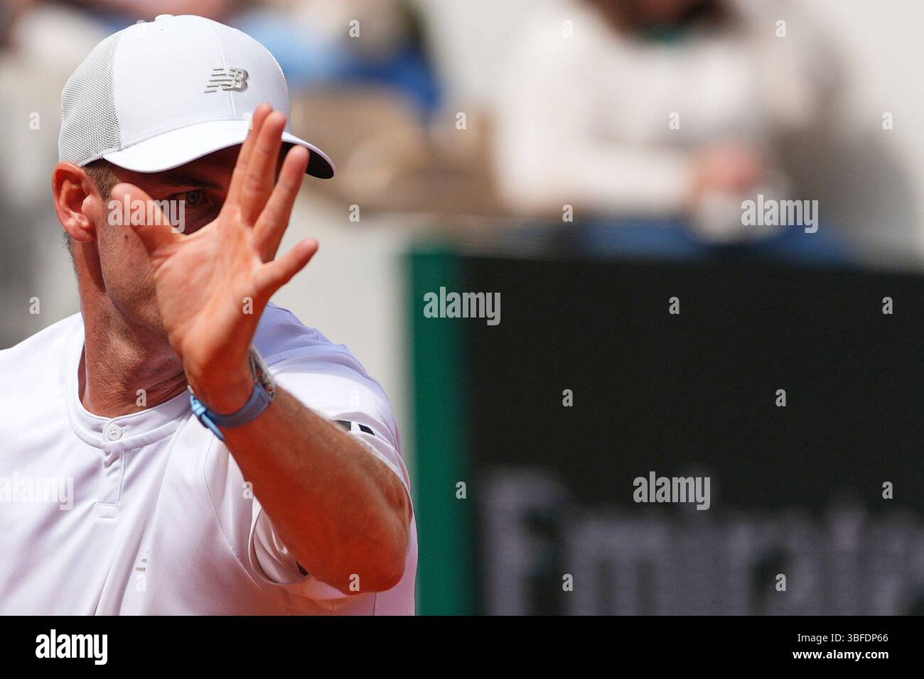 Tommy Paul of the U.S. reacts as he plays Australia's Alexei Popyrin ...