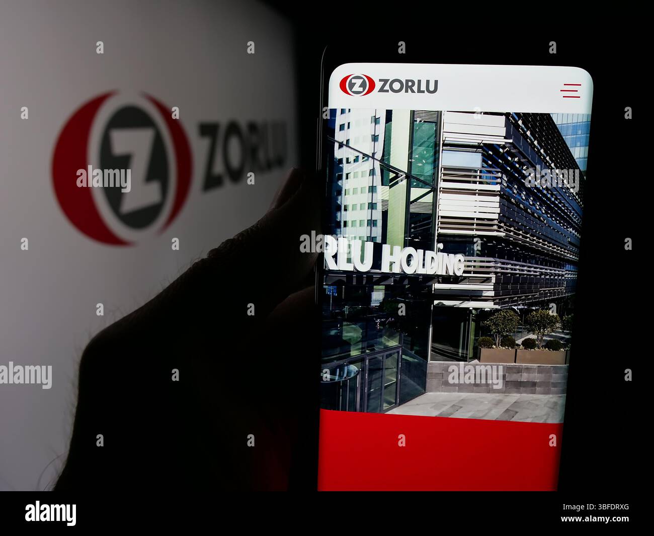 May 7, 2025, Germany: In this photo illustration, a person is holding a cellphone with the ...