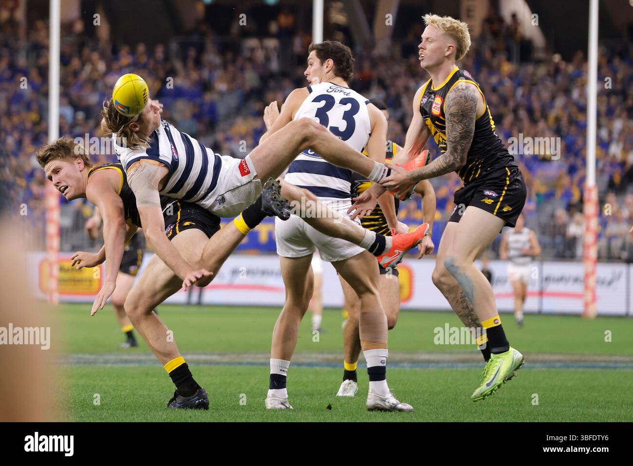 Perth, Australia. 01st June, 2025. Mark Blicavs of the Cats attempts to ...