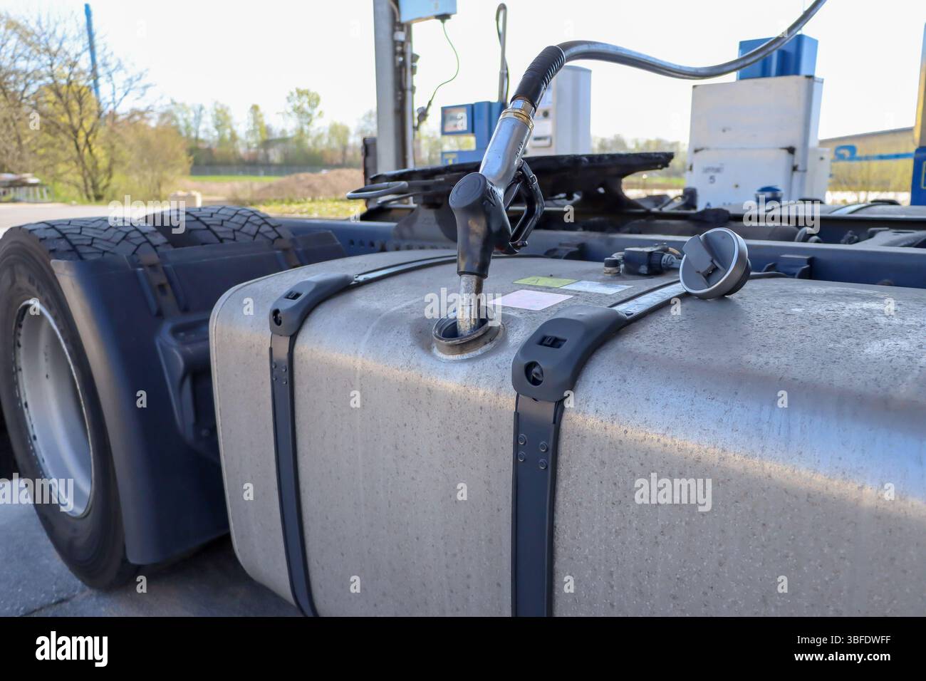 Refueling a truck with diesel fuel. Refueling nozzle in the tank of a ...
