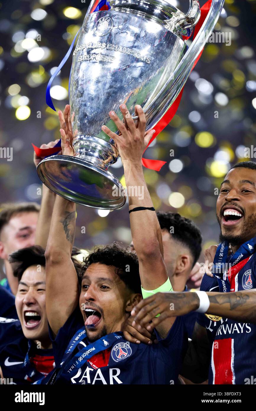 Munich, Germany. 01st June, 2025. PSG player Marquinhos with the trophy ...