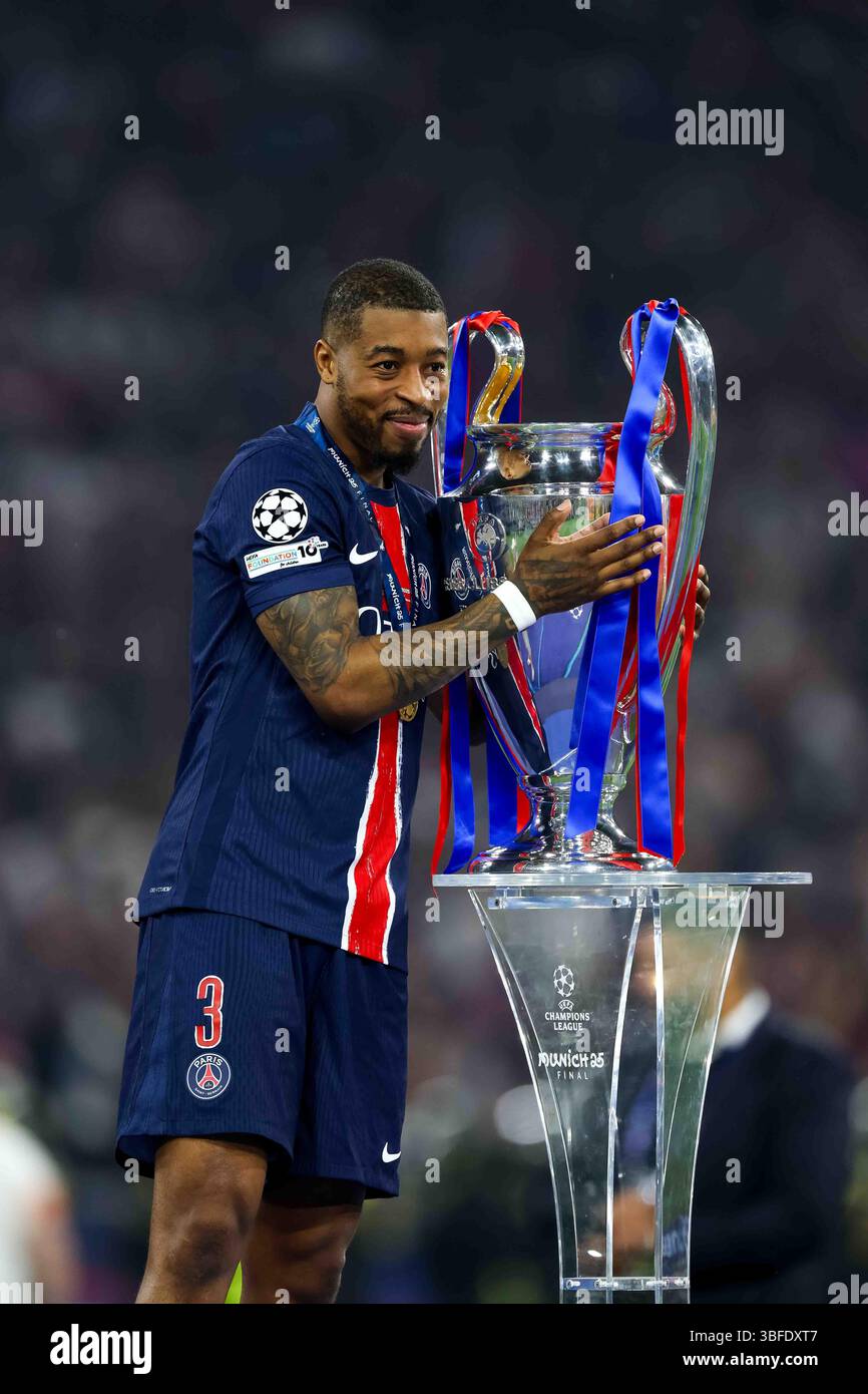 Munich, Germany. 01st June, 2025. PSG player Presnel Kimpembe hugging ...