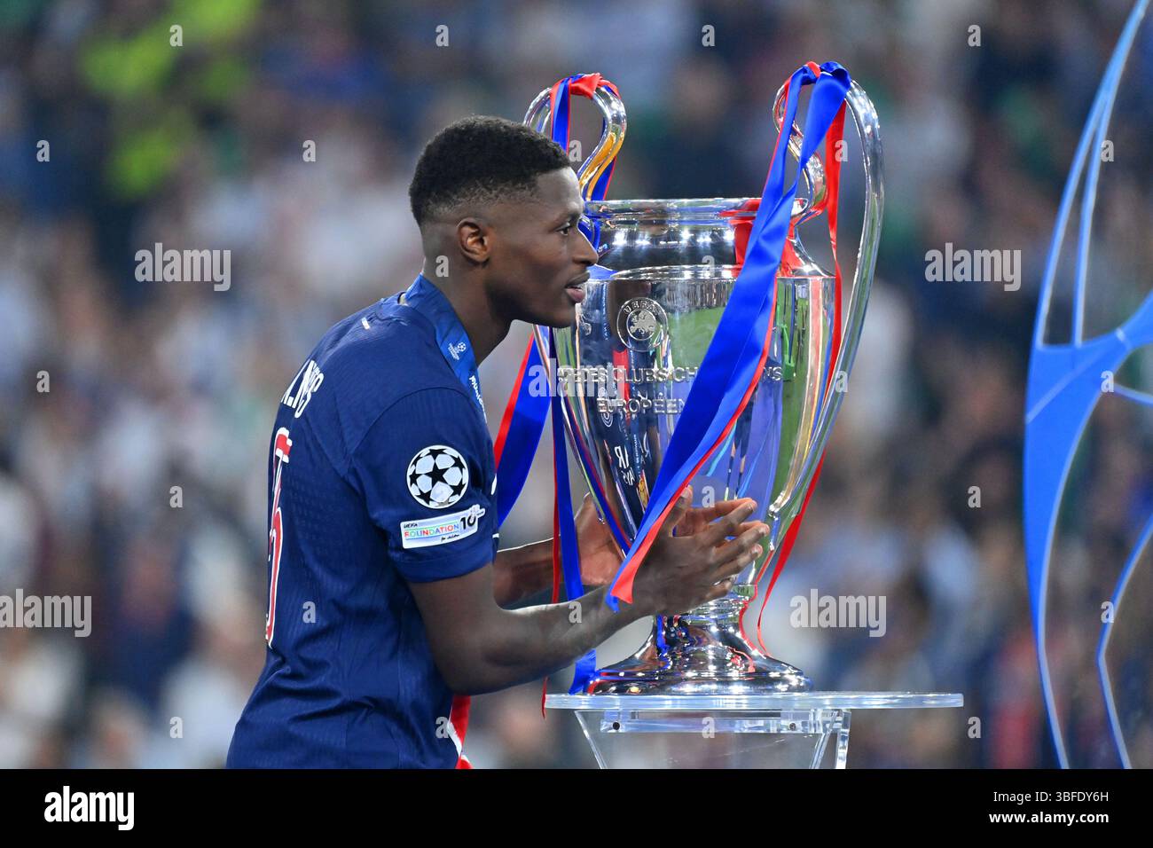 Nuno Mendes (PSG) with the cup, trophy, award ceremony, football UEFA Champions League final ...