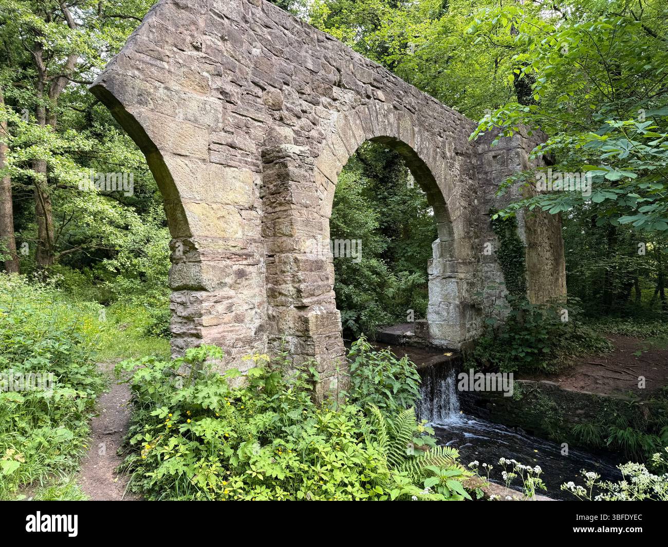 Folly and small waterfall in Worden Park, Leyland Stock Photo - Alamy