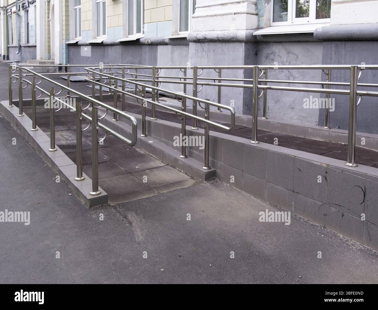 Ramp with metal railings for disabled people, copy space Stock Photo ...