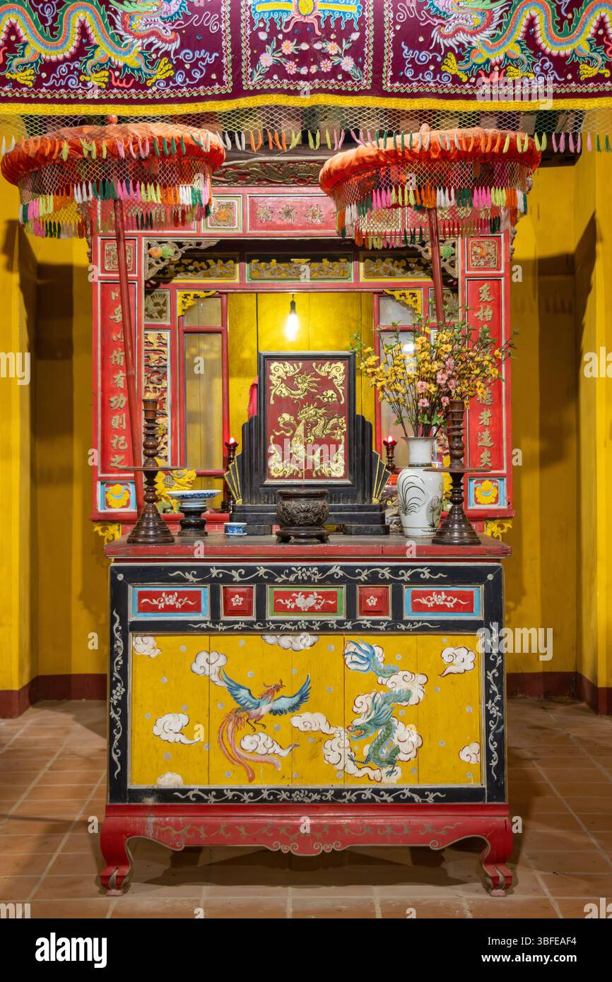 HOI AN, VIETNAM, APR 26 2025, Traditional Asian altar with ornate ...