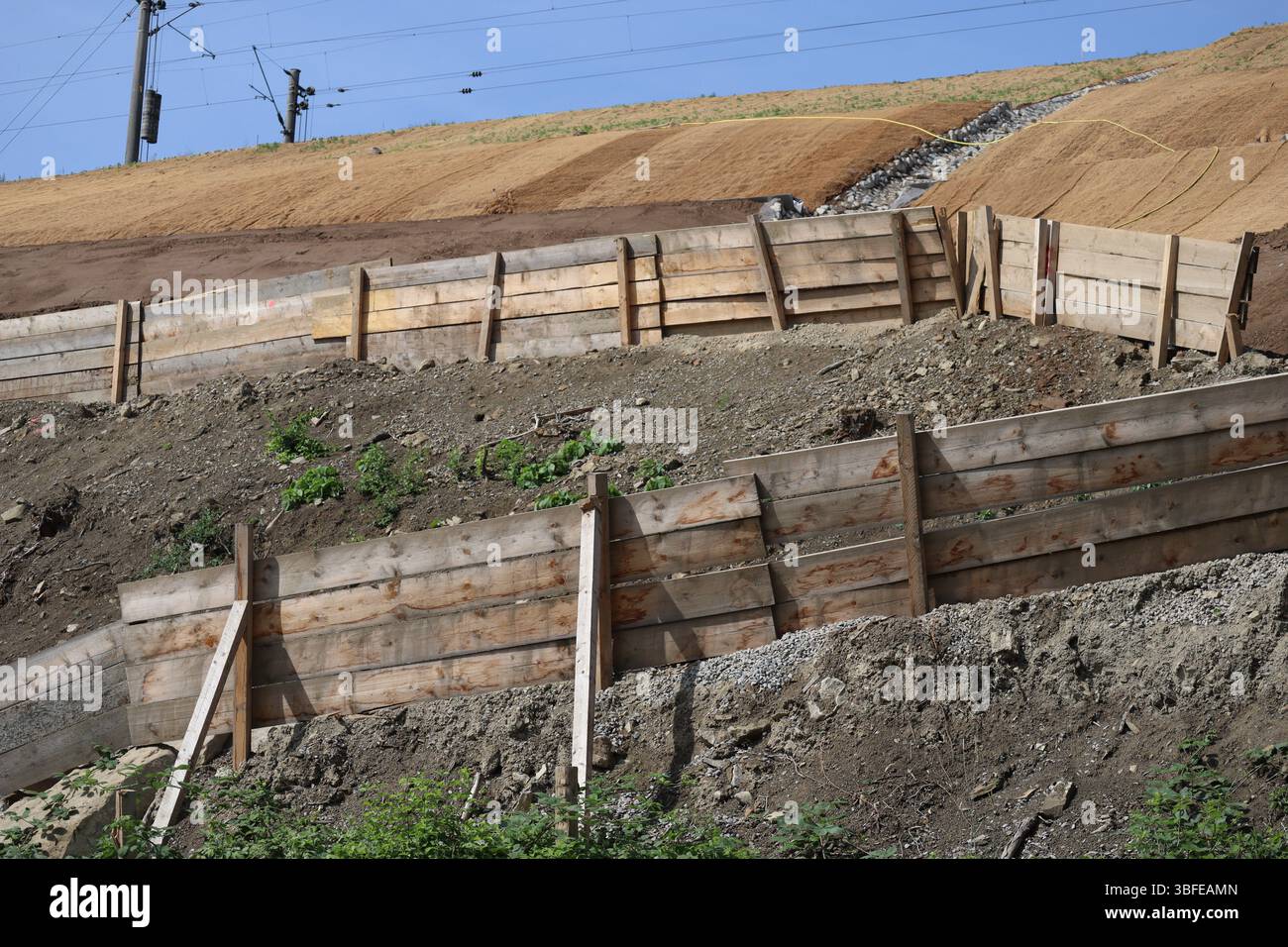Board walls for securing a Landslide Stock Photo - Alamy
