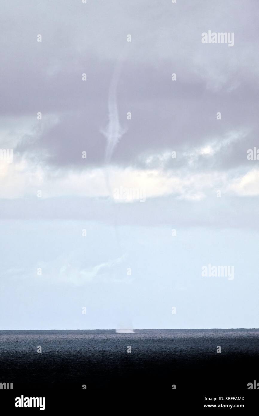 A waterspout weather phenomenon seen off Raiatea, French Polynesia ...