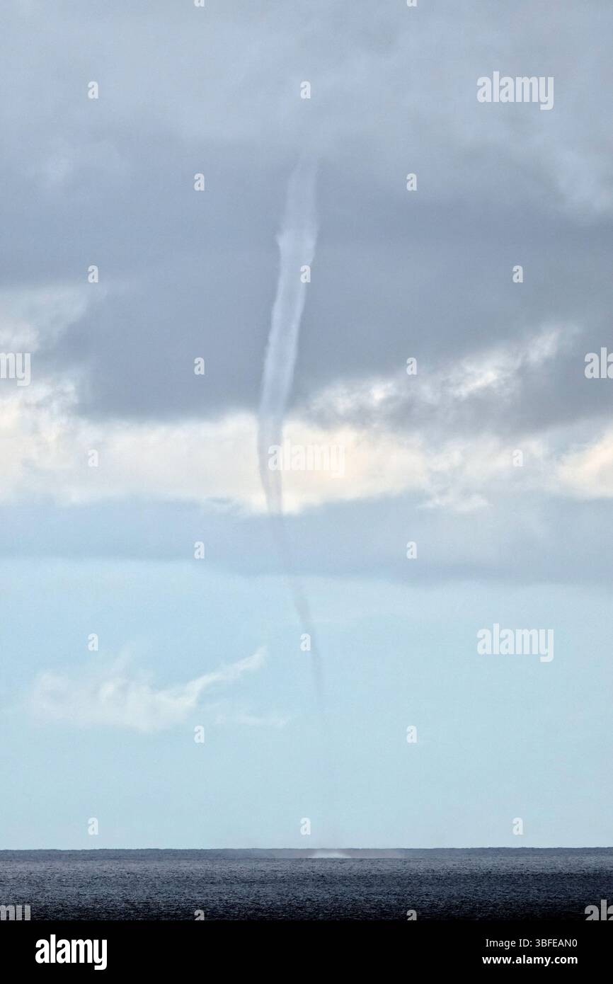 A waterspout weather phenomenon seen off Raiatea, French Polynesia ...