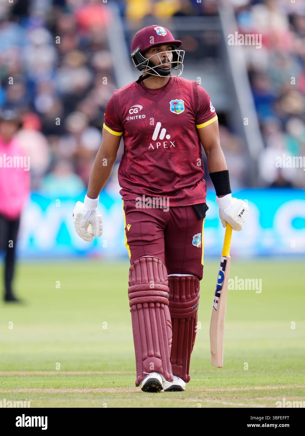 West Indies' Brandon King shows his dejection as he walks off after ...