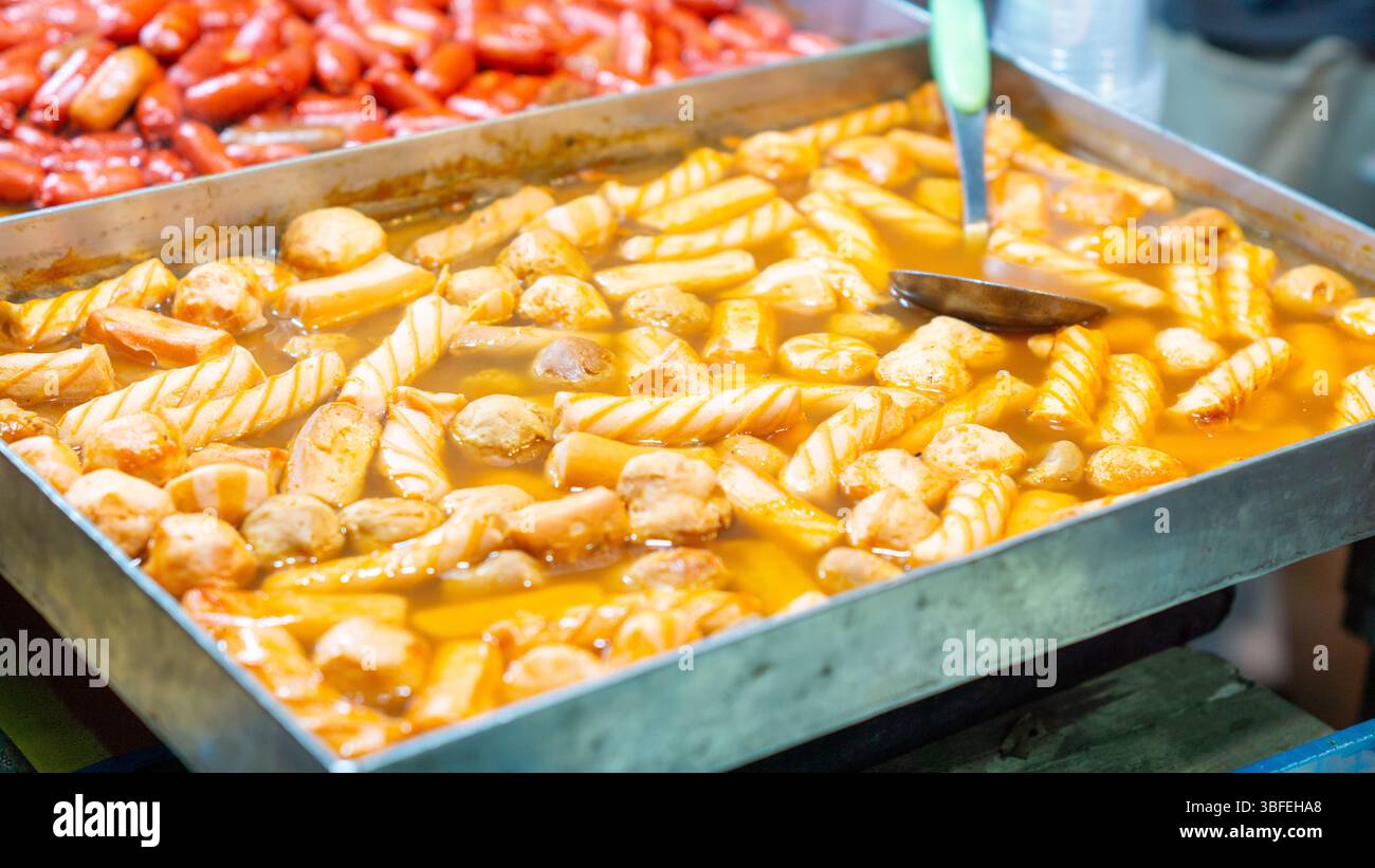 Tteokbokki, Korean dish of rice flour cooked in spicy and sweet ...
