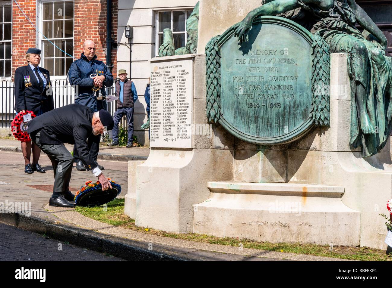 An Ex Soldier Lays A Wreath At The Town War Memorial During An Event To ...
