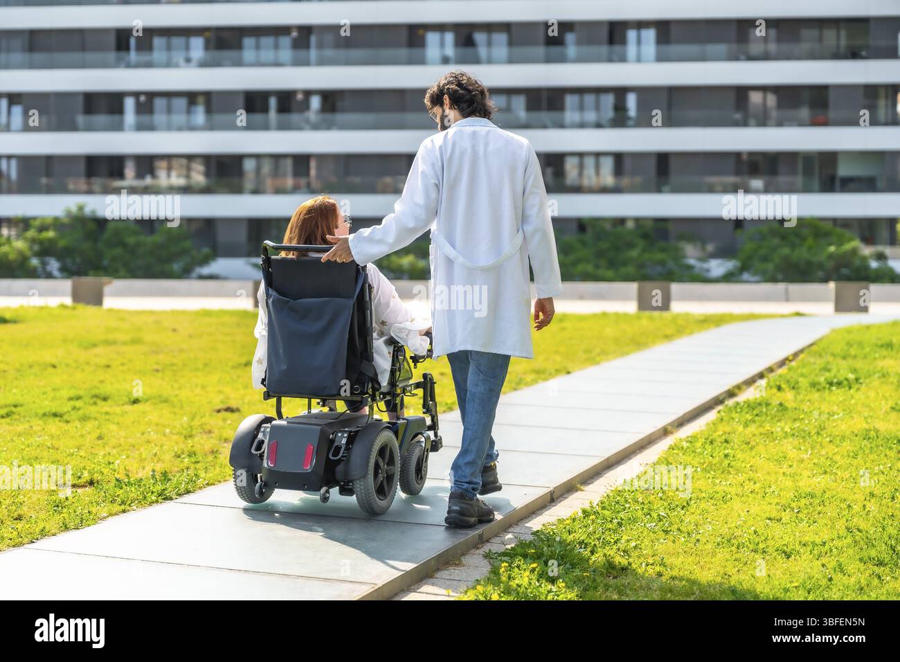Male female doctor walk through hi-res stock photography and images - Alamy