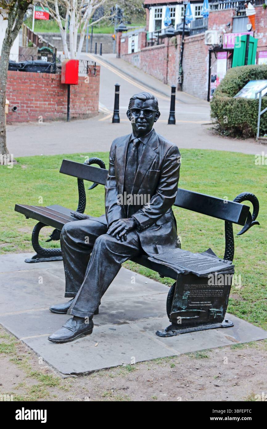 Statue of George A Moore, founder of Moore's Furniture Group, sat on ...