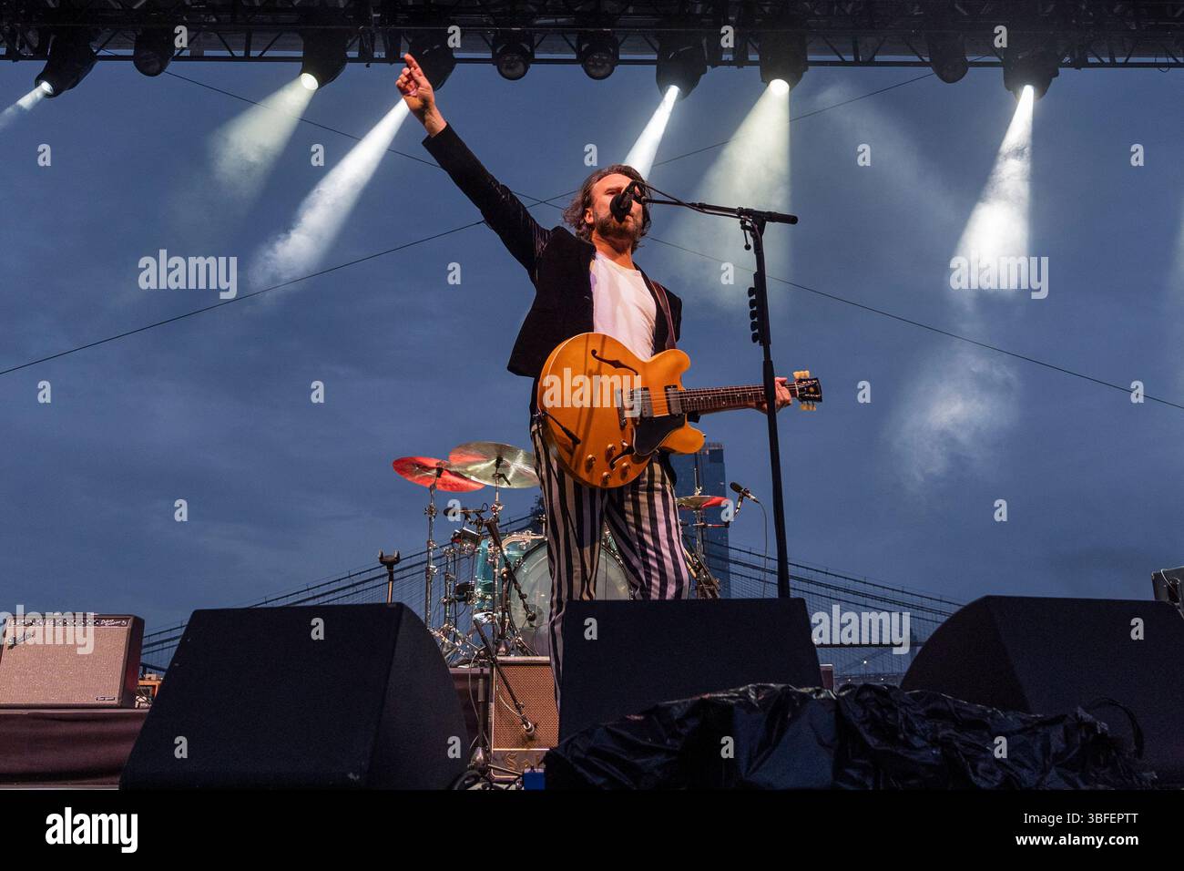 Nic Cester on rhythm guitar and vocals performs with Australian band ...