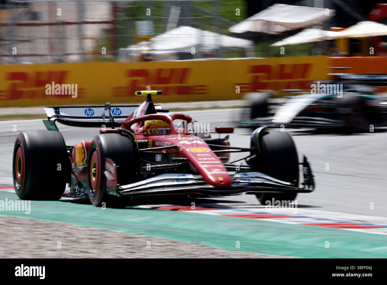 Ferrari driver Lewis Hamilton of Britain steers his car during the ...