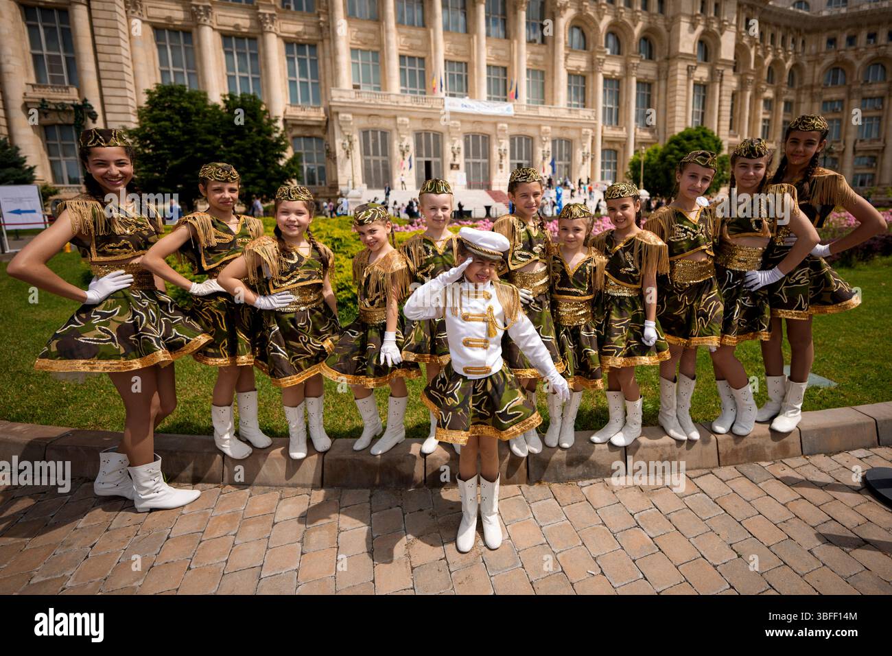 Students of a dance school strike a pose outside Romania's Palace of ...