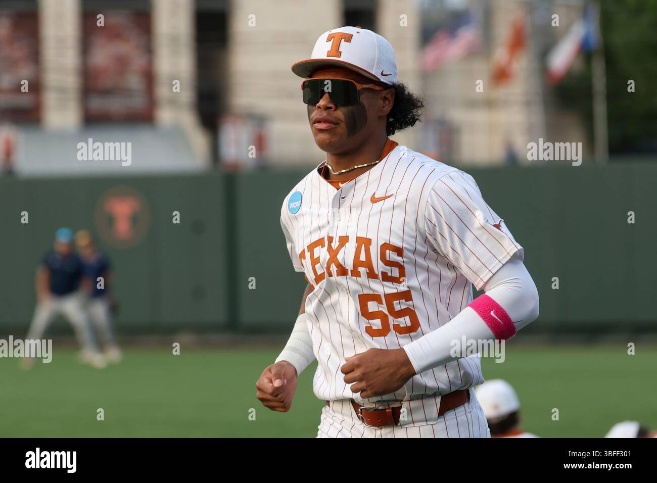 AUSTIN, TX - MAY 31: Texas outfielder Jonah Williams (55) jogs off the ...