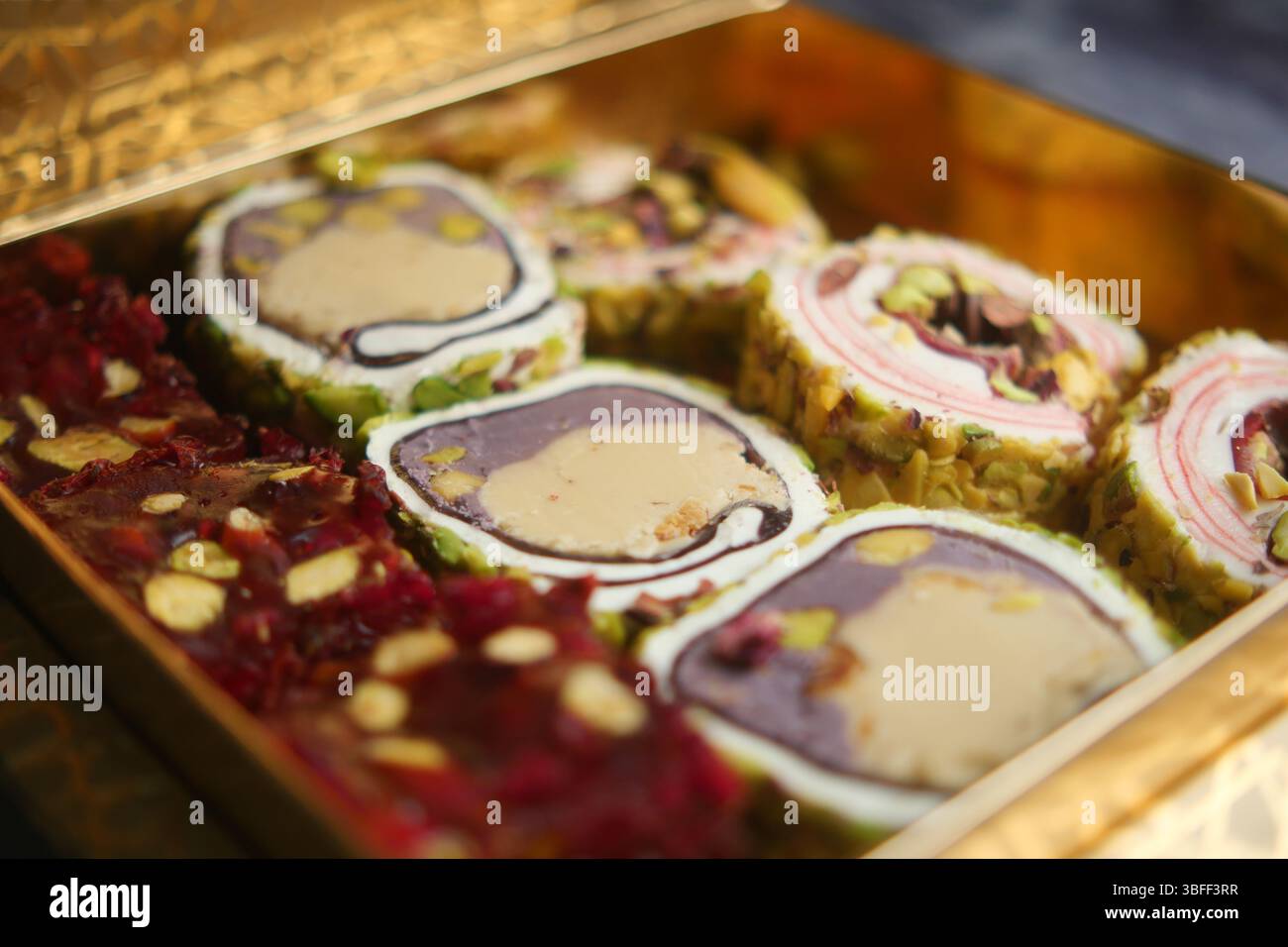 Colorful layers of traditional turkish sweets in an ornate box Stock ...