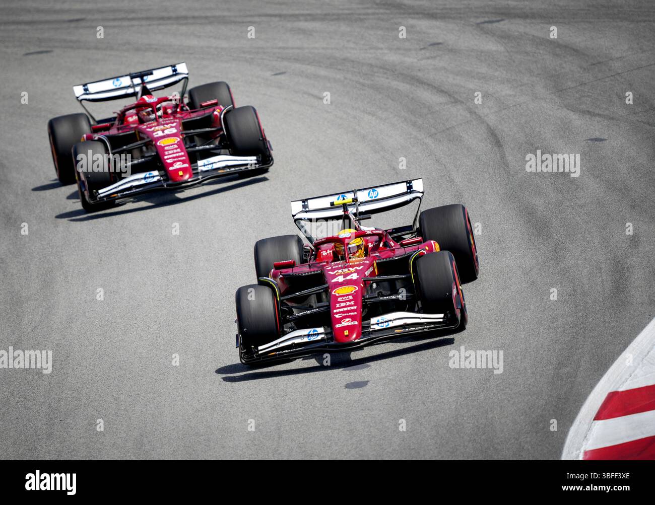 BARCELONA - Lewis Hamilton (Ferrari) in action in front of Charles ...