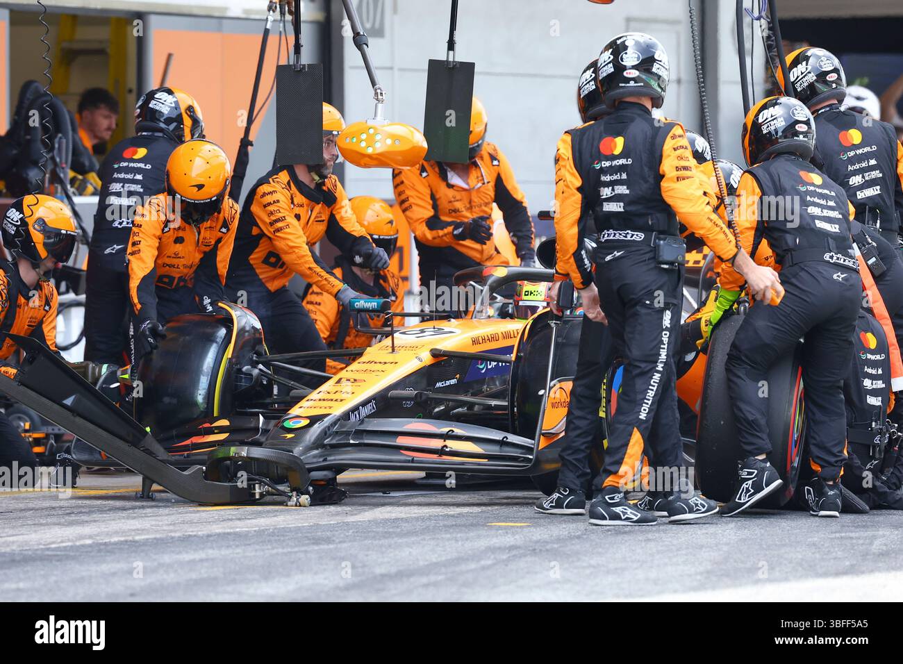 McLaren driver Oscar Piastri of Australia gets a pit service during the ...