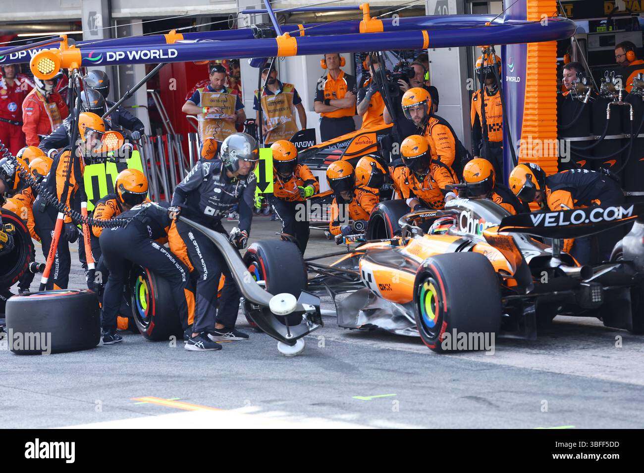 McLaren driver Oscar Piastri of Australia gets a pit service during the ...