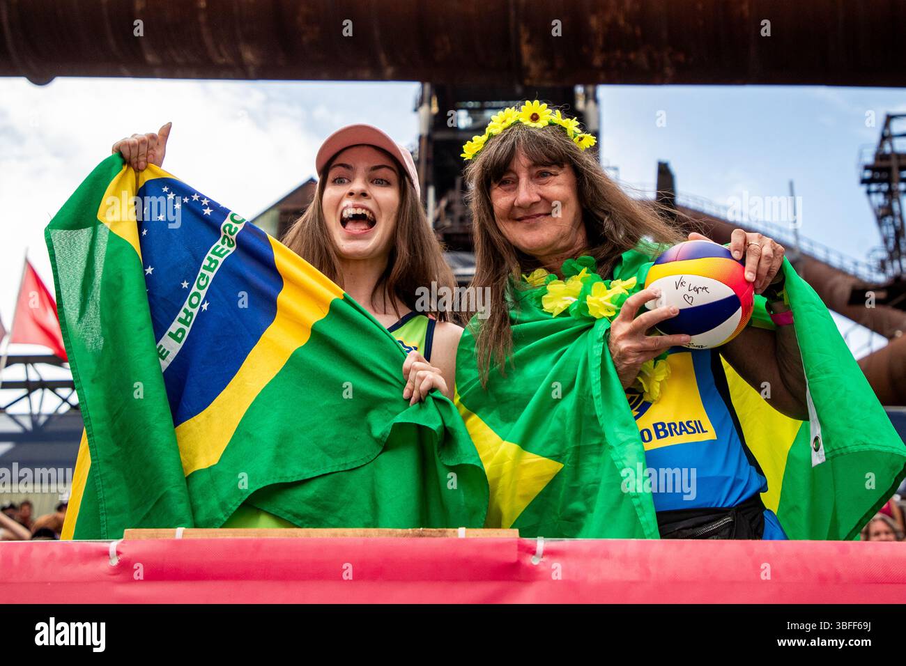 Fans with Brazilian flag in action during the Pro Tour beach volleyball ...