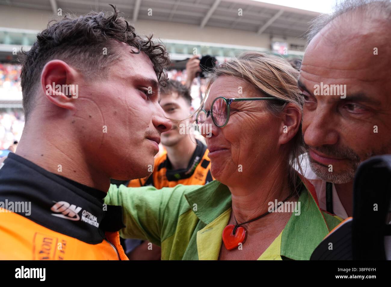 McLaren's Lando Norris celebrates with mother Cisca Wauman and father ...