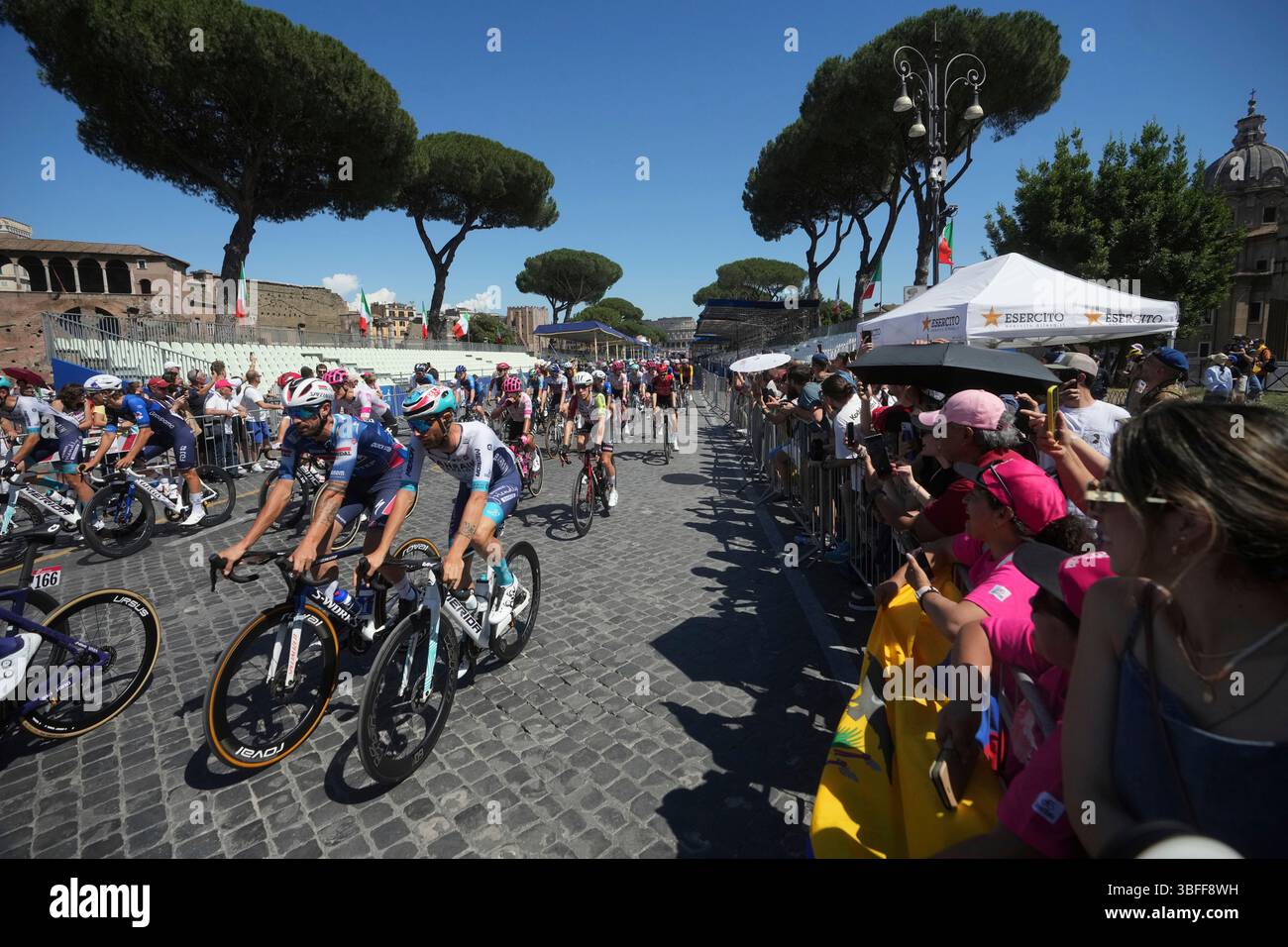 The pack rides towards the Vatican before the official start of the ...