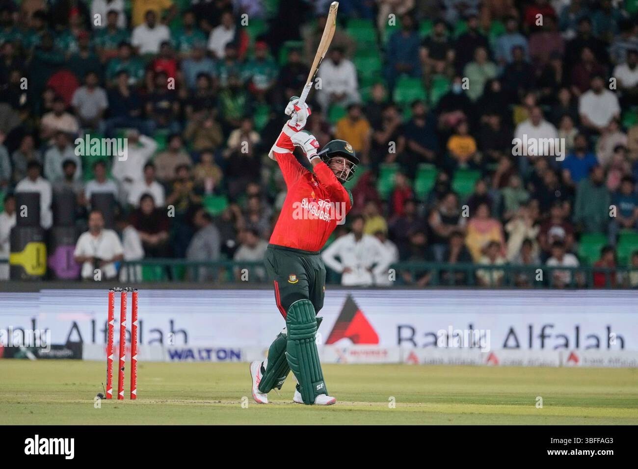 Bangladesh's Parvez Hossain Emon follows the ball after playing a shot for boundary during the ...