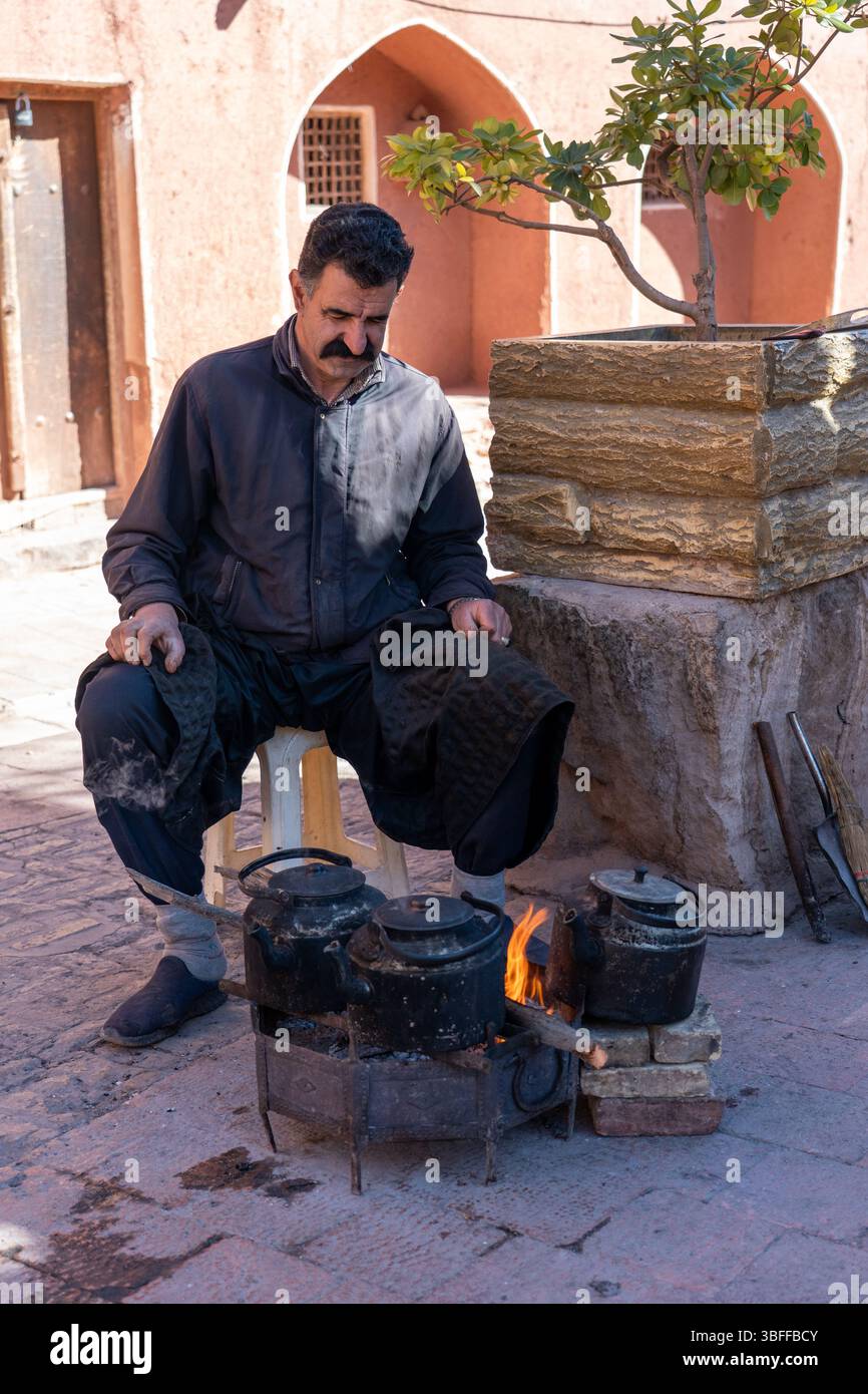 Sitting beside fire hi-res stock photography and images - Alamy