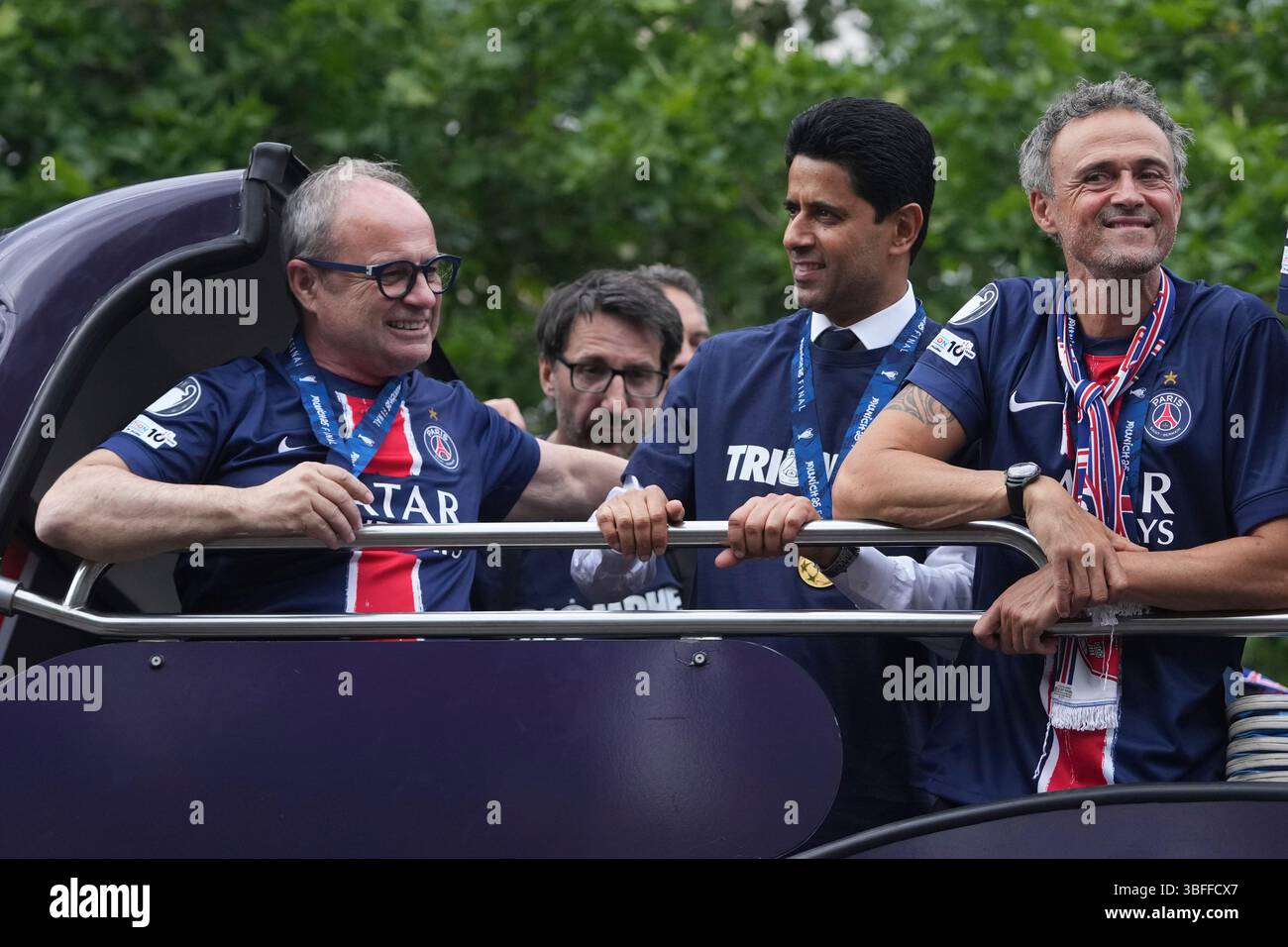 PSG's head coach Luis Enrique, right, and PSG owner Nasser bin Ghanim ...