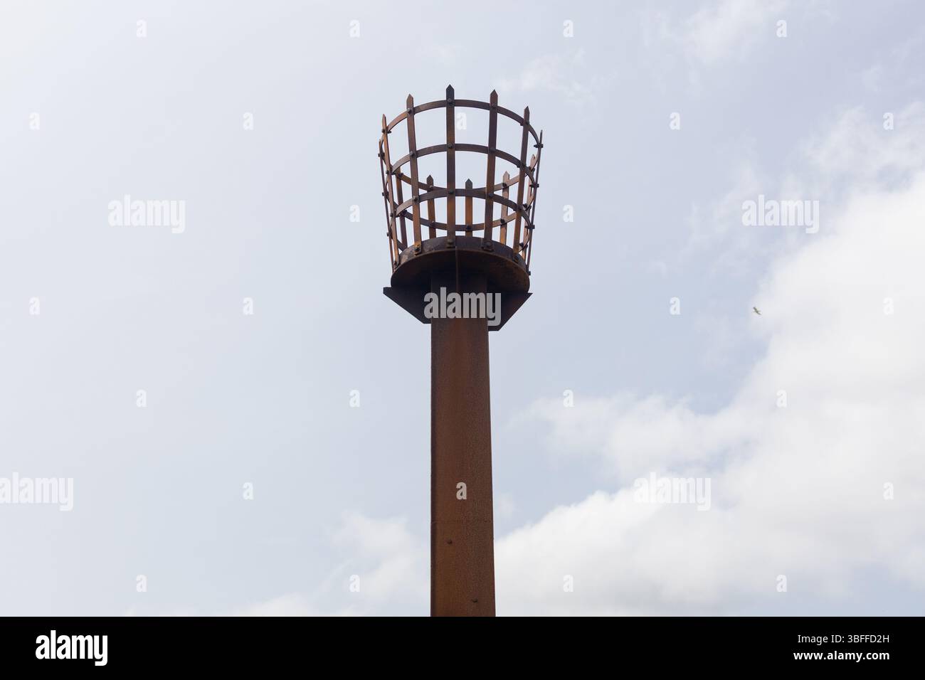 Fire Beacon with Blue Sky and Clouds Stock Photo - Alamy