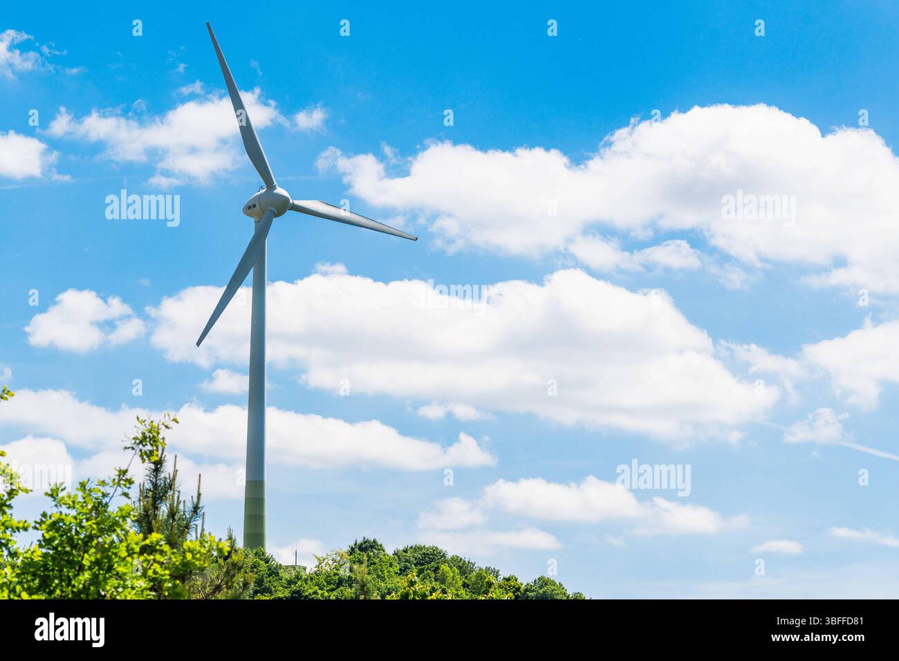 Munich, Bavaria, Germany - 30 May 2025: A large SWM wind turbine is ...