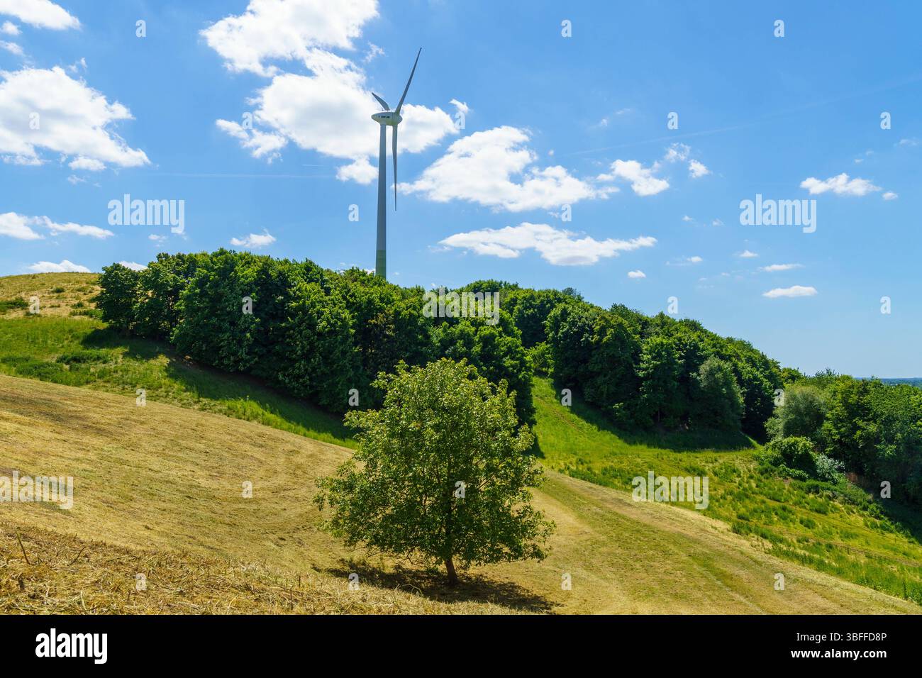 Munich, Bavaria, Germany - 30 May 2025: A large SWM wind turbine is ...
