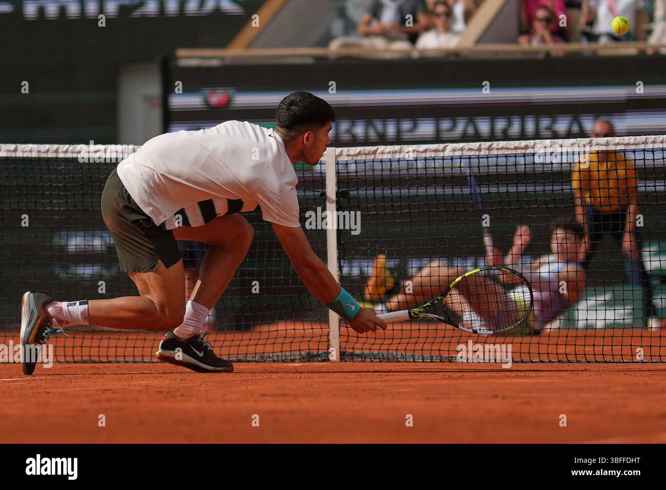 Spain's Carlos Alcaraz plays a volley to Ben Shelton of the U.S. during ...
