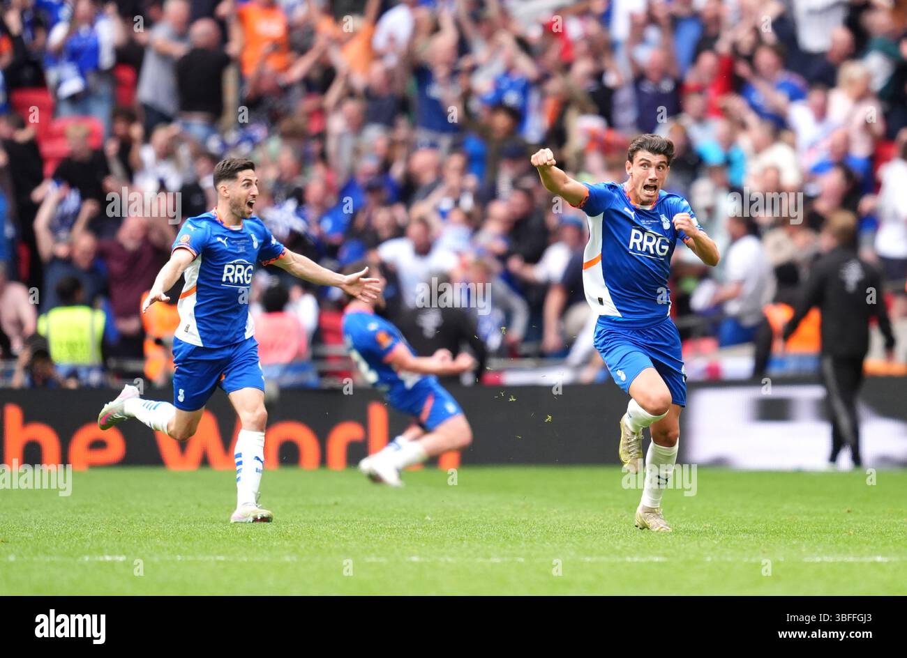 Oldham Athletic's Kian Harratt (right) celebrates scoring their side's ...