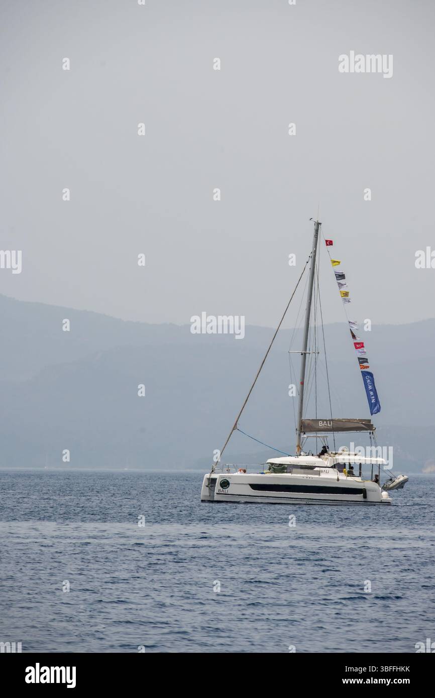 fethiye turkey 26 may 2025: sleek white catamaran, identifiable by its ...
