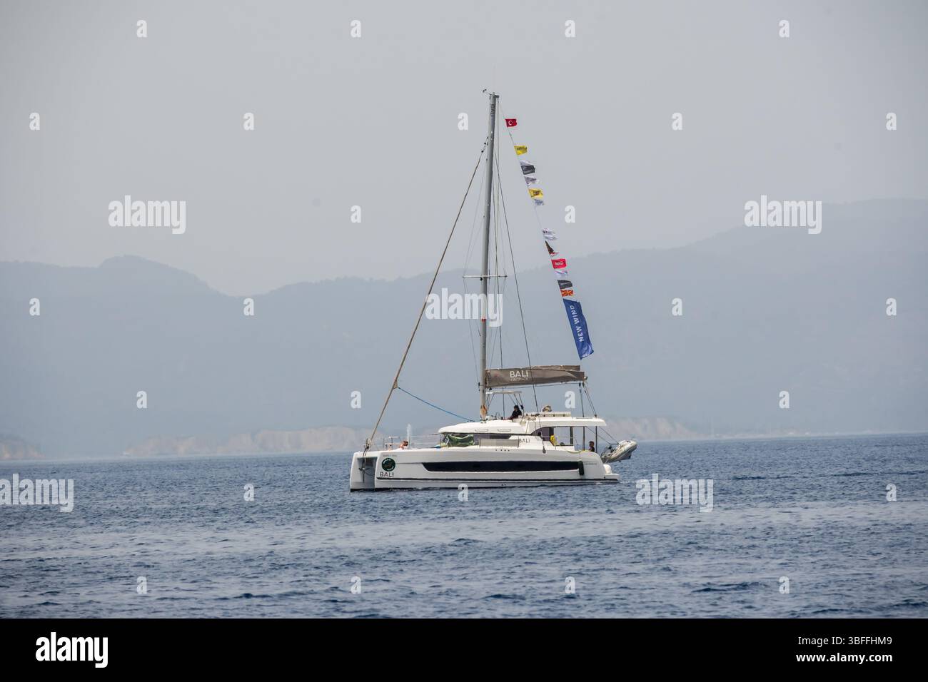 fethiye turkey 26 may 2025: sleek white catamaran, identifiable by its ...