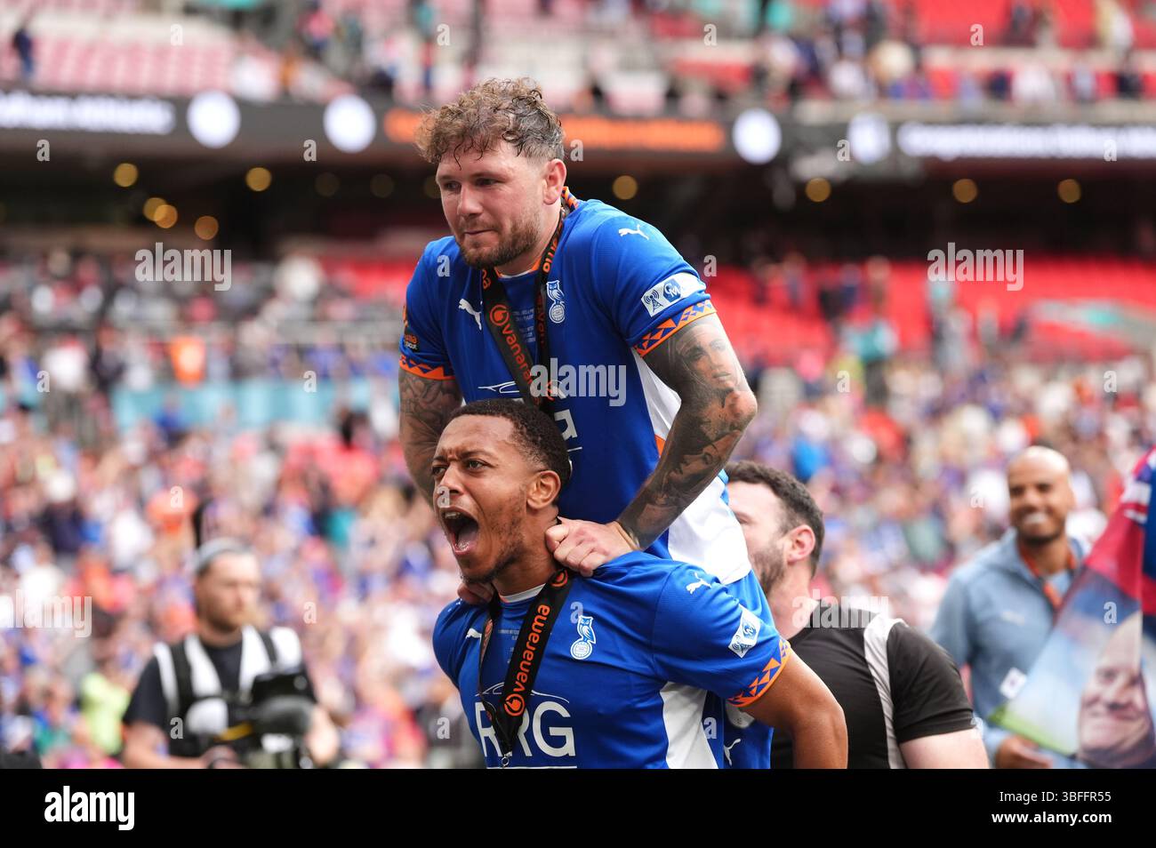 Oldham Athletic's Shaun Hobson and James Norwood celebrate promotion to ...