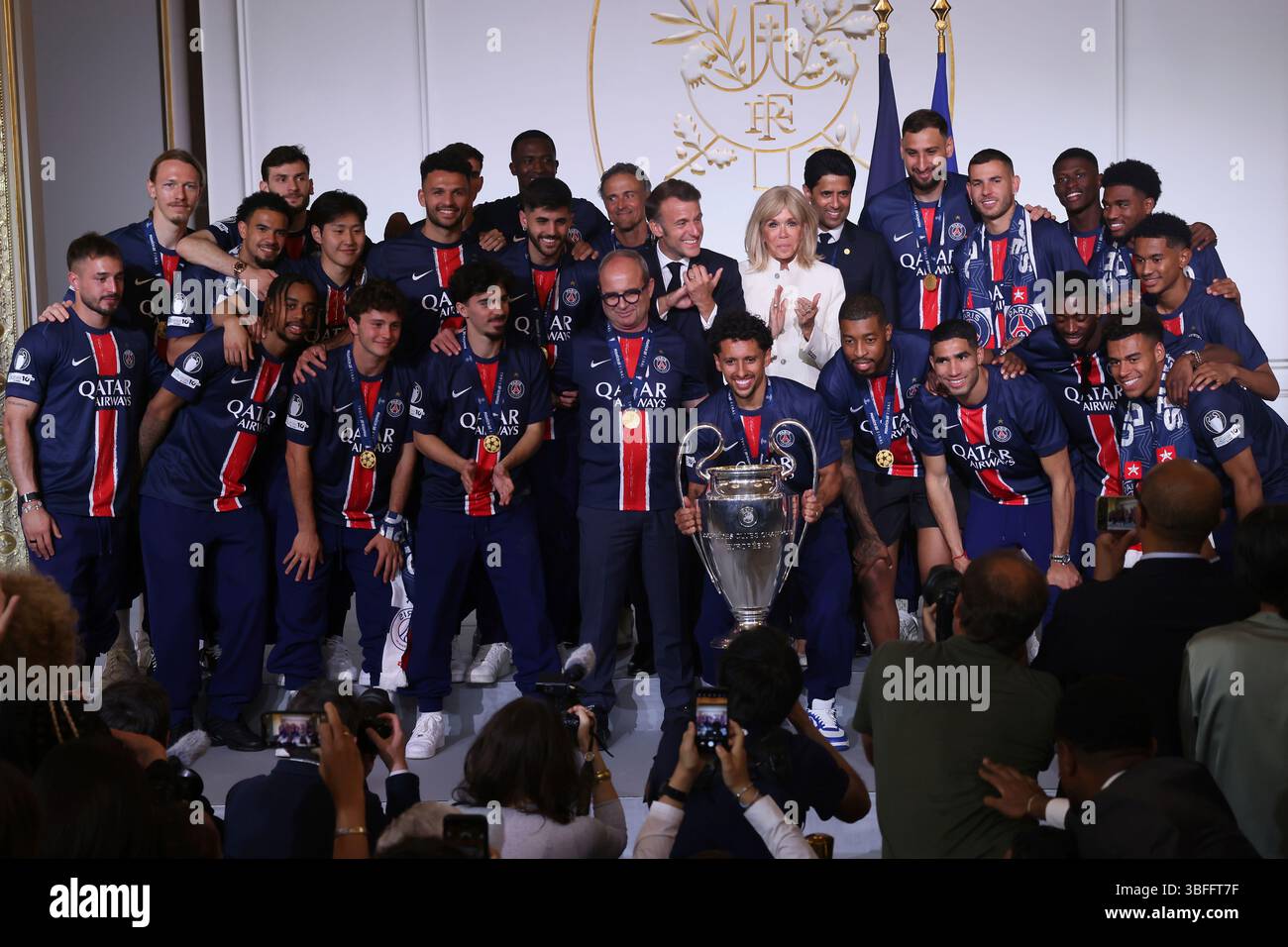 French President Emmanuel Macron, center left, his wife Brigitte Macron ...