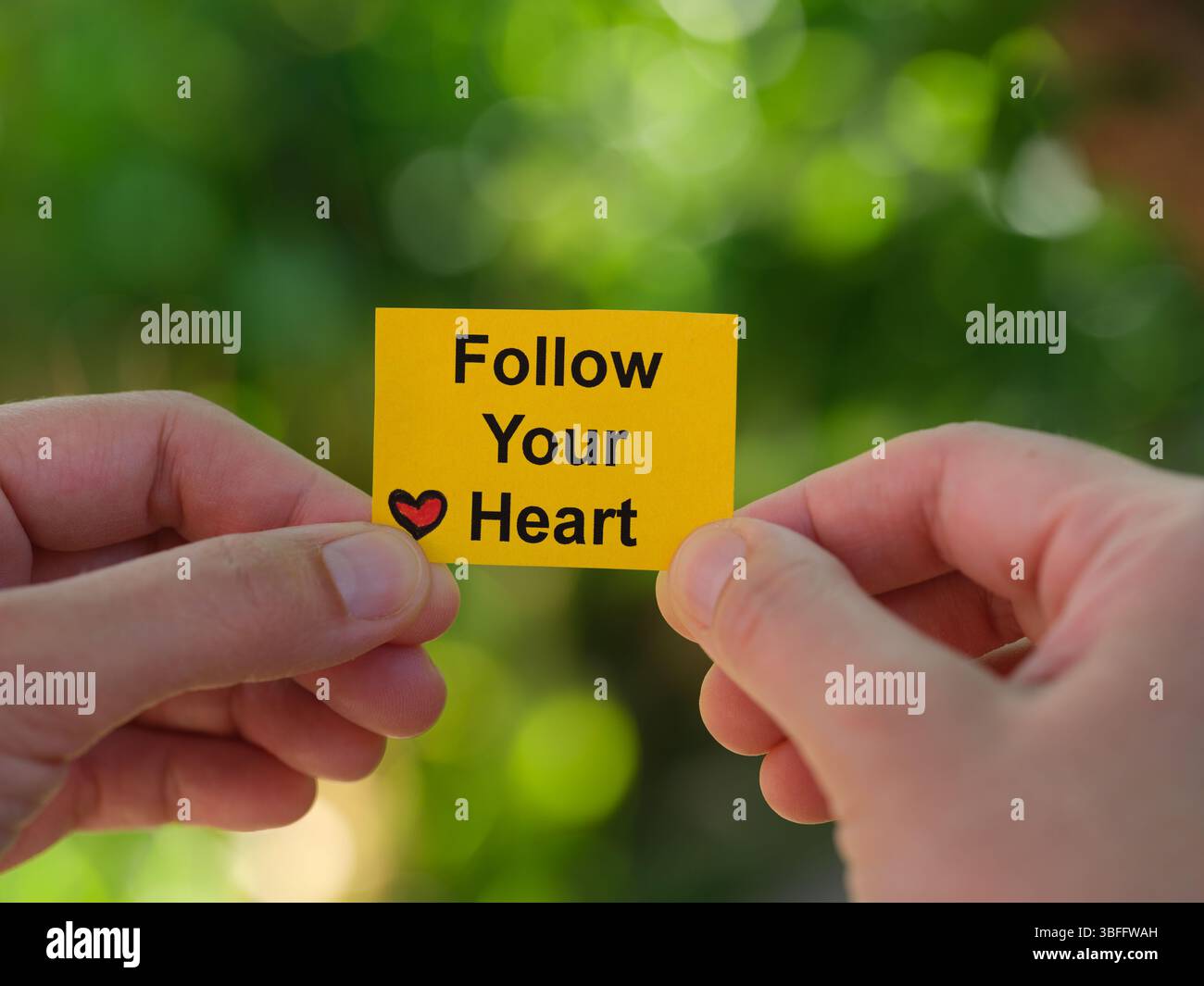 Follow heart written hand hi-res stock photography and images - Alamy