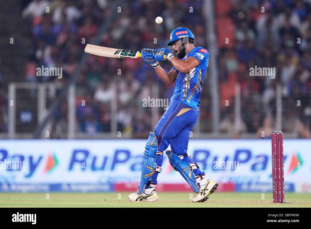 Mumbai Indians' Naman Dhir plays a shot during the Indian Premier ...