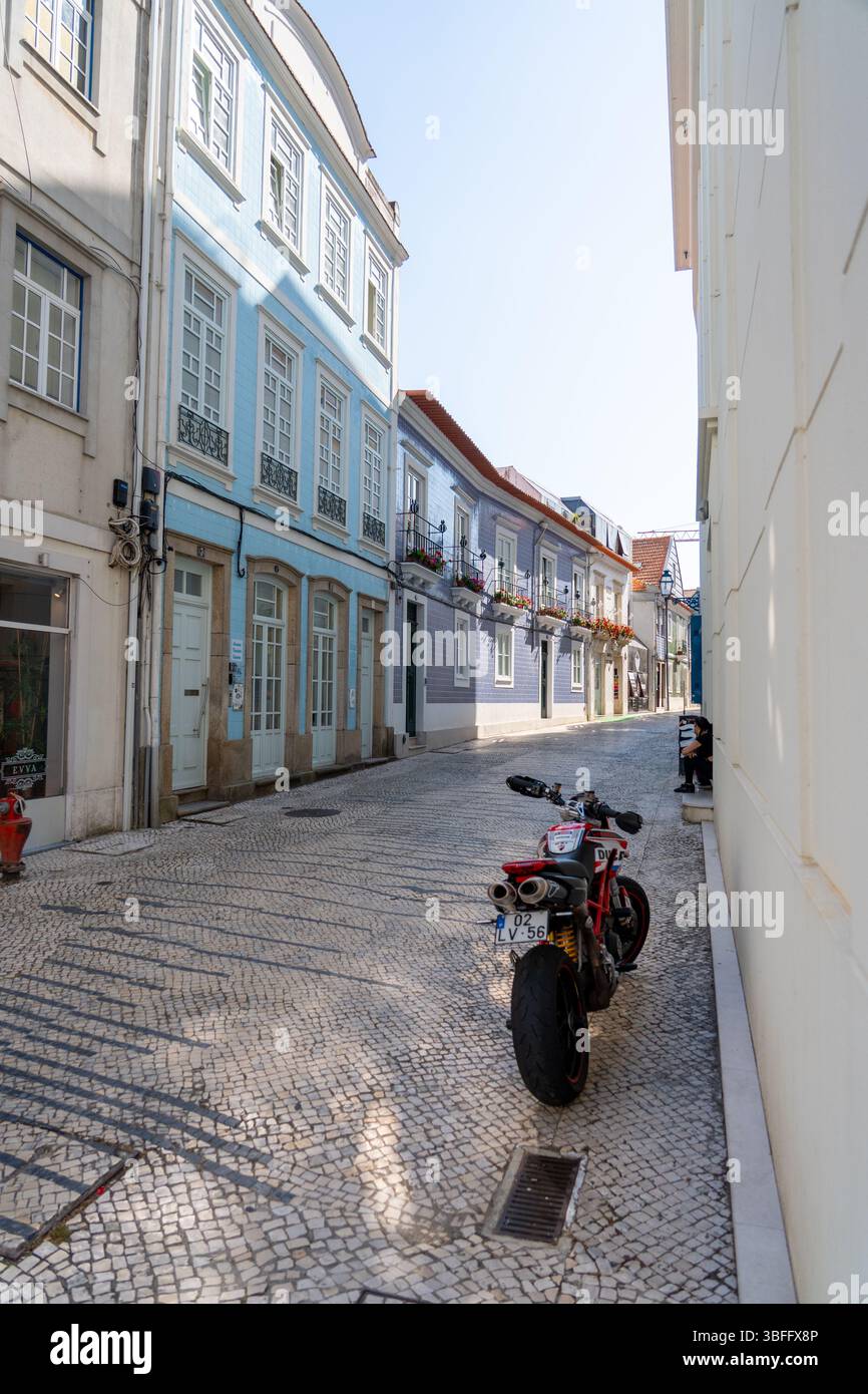 Aveiro, Portugal - May 12, 2024: A narrow, historic cobblestone street ...
