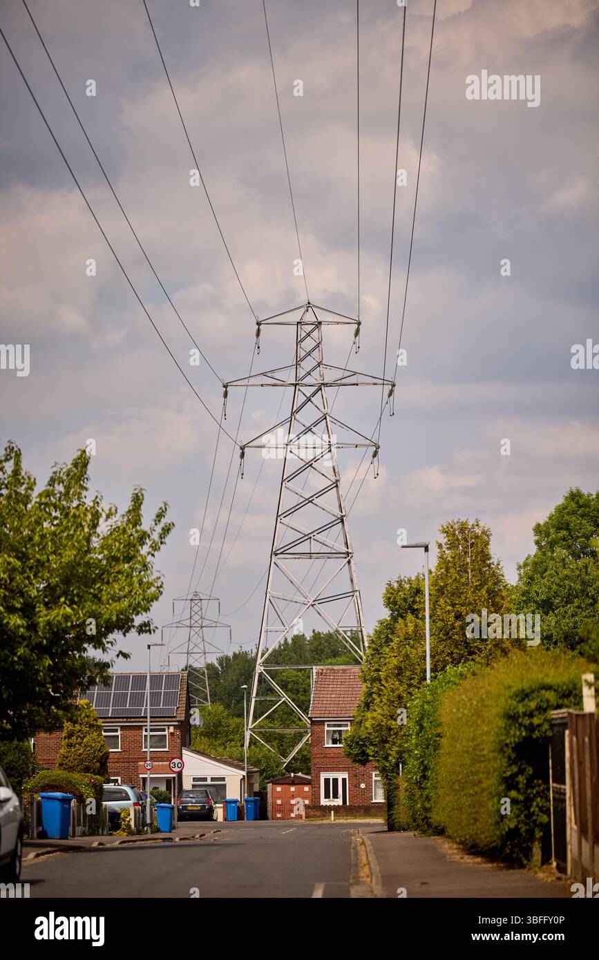 Transmission tower electricity pylon, hydro tower in a back garden of a ...