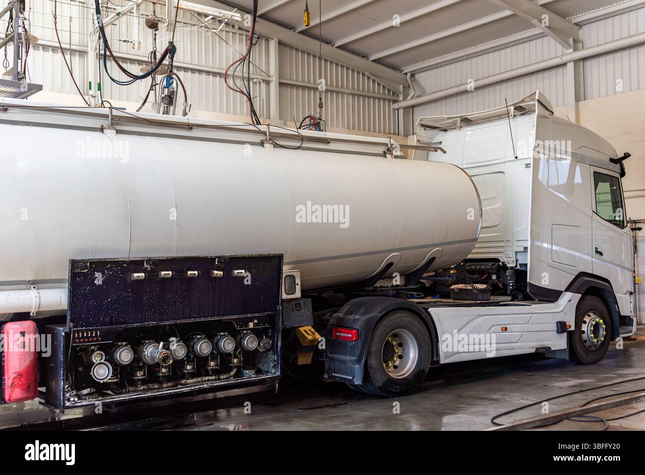 Tanker truck at a wash station for interior cleaning, mandatory to ...
