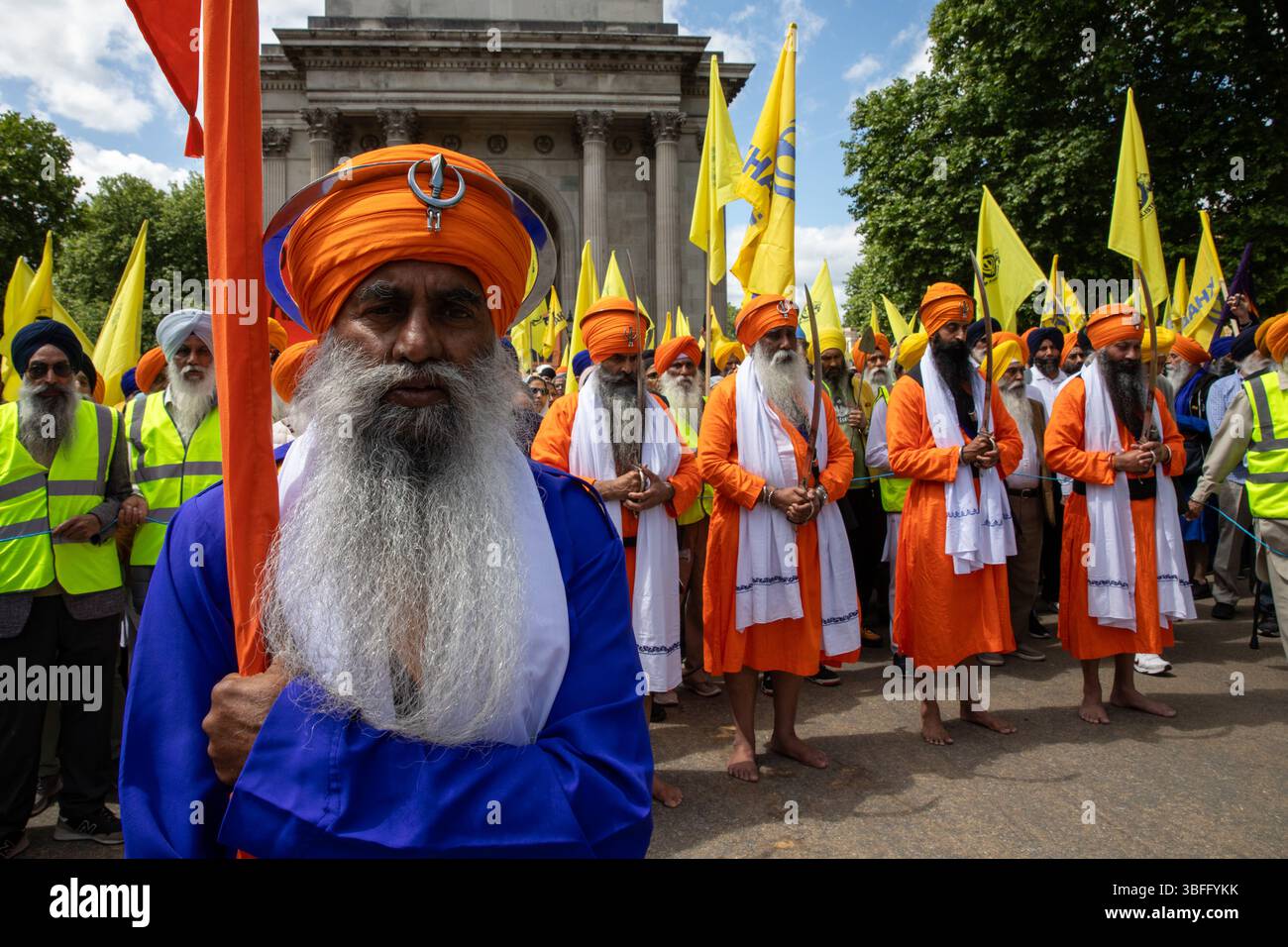 Sikh Khalsa prepares to march during a rally. Thousands of British ...