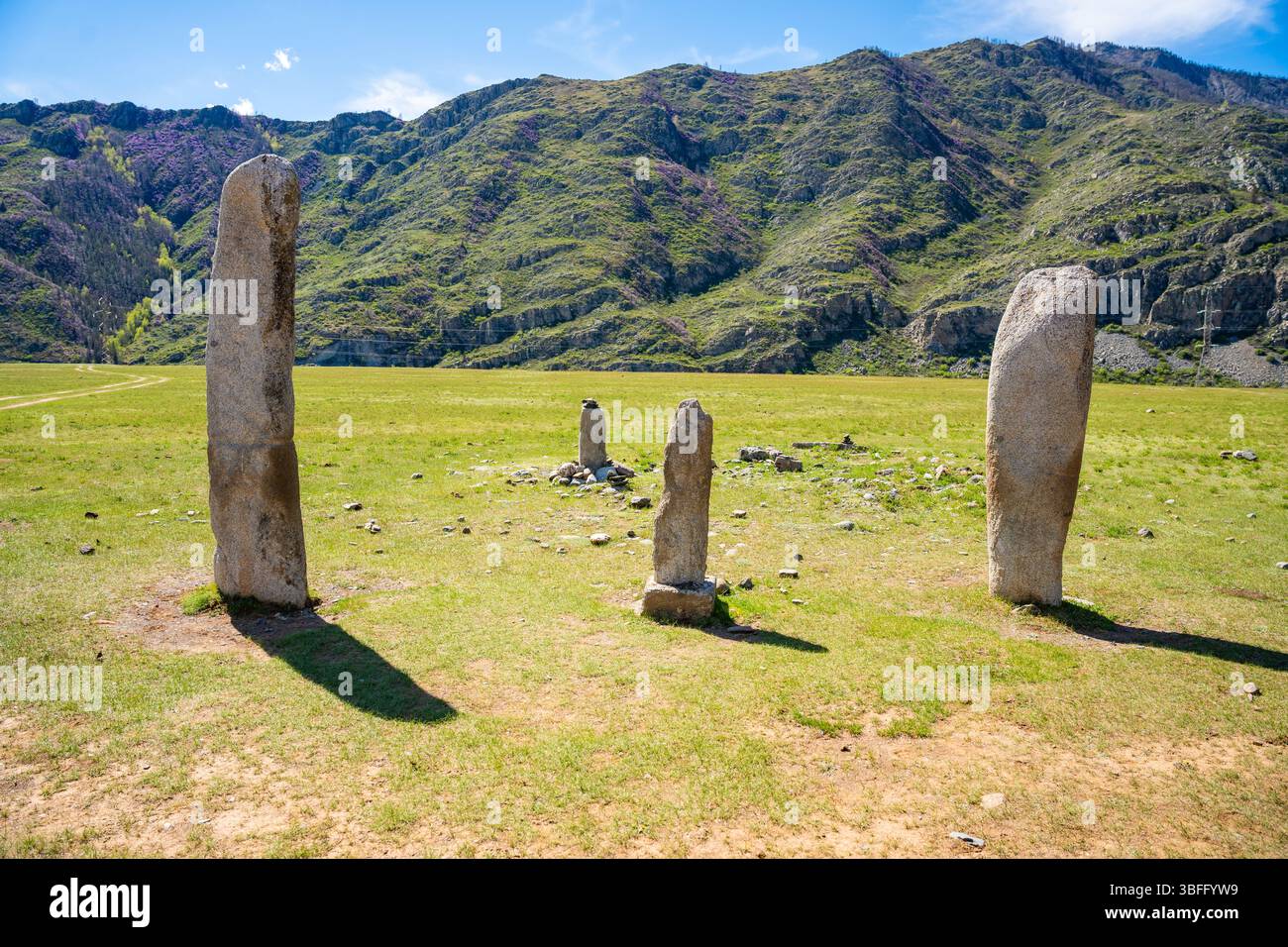 Vertical stone slabs known as Inin steles forming a sacred site near ...